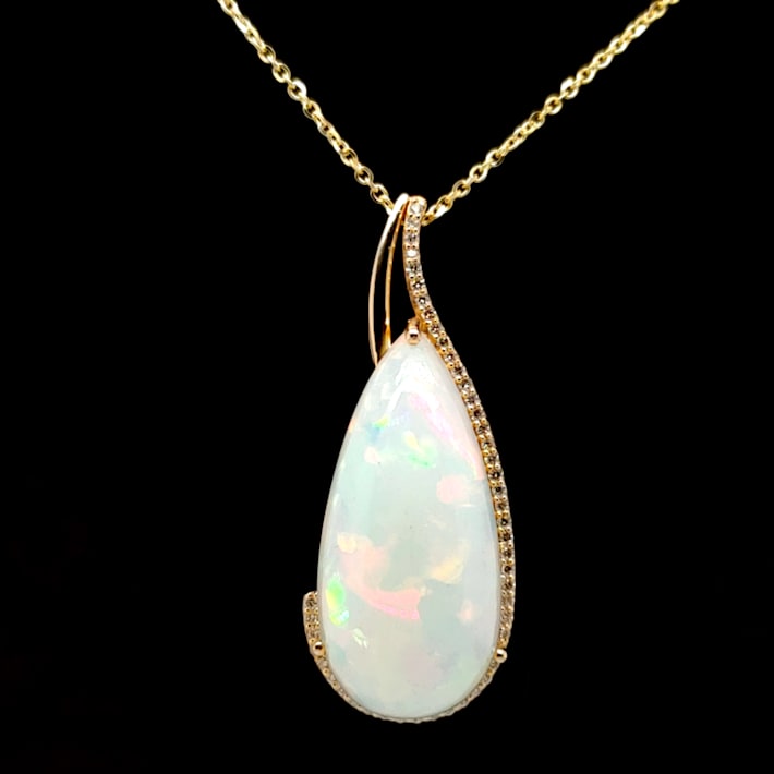 Ethiopian Opal Pear Shape Cabochon and Round Diamond 14K Yellow Gold Pendant with Chain, 15 ...