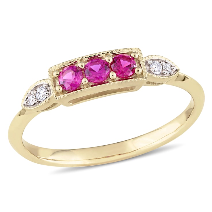 1/4 CT TGW Created Ruby and Diamond Accent 3-Stone Ring in 10K Yellow ...